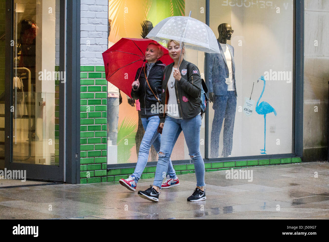 Wet and windy day in preston city centre hi-res stock photography and ...