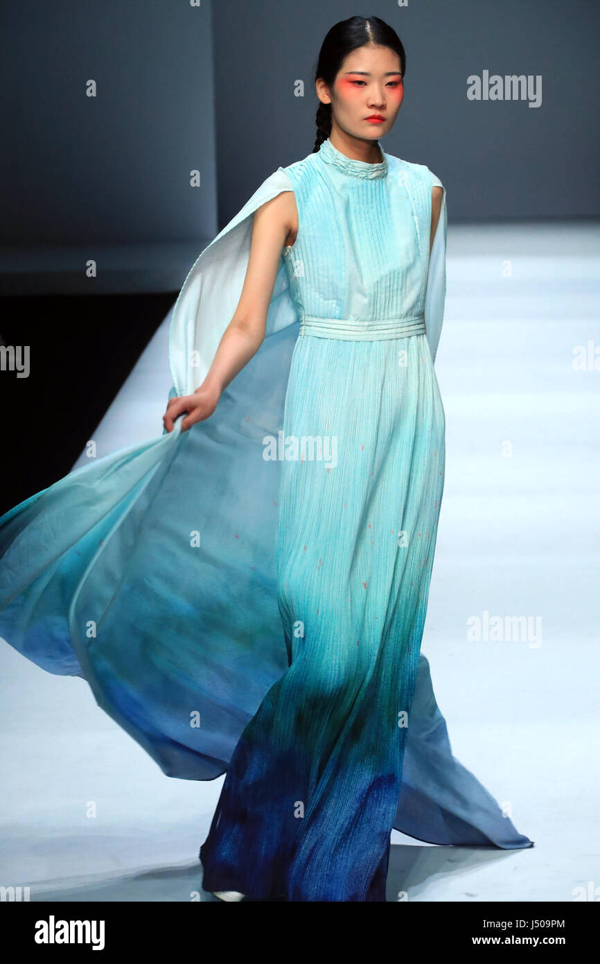 Beijing, China. 15th May, 2017. A model presents a creation designed by ...