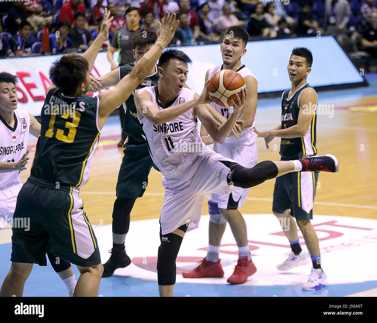 Quezon City, Philippines. 15th May, 2017. Larry Liew of Singapore (C ...