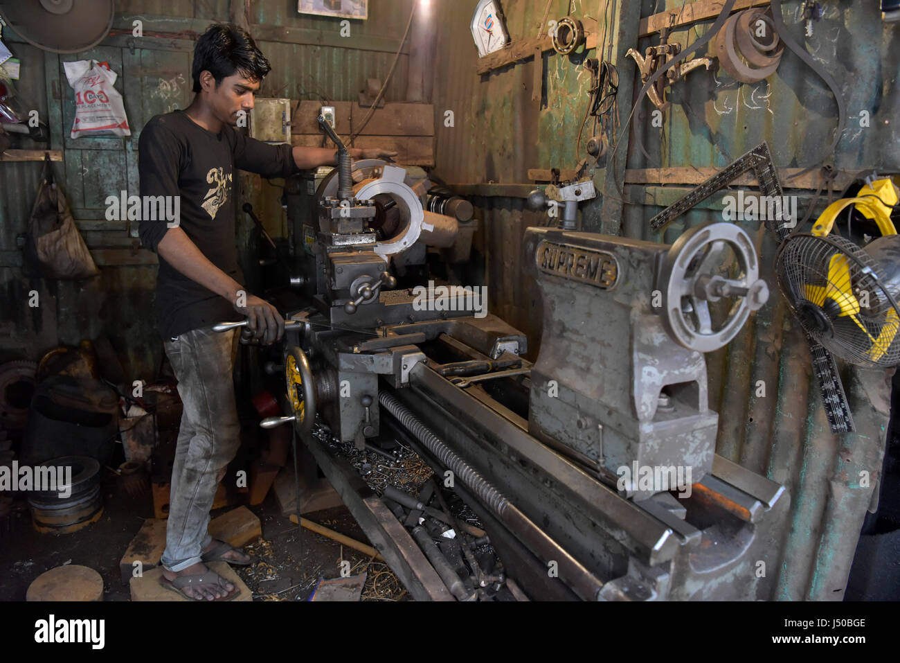 Dhaka, Bangladesh. 15th May, 2017. A Bangladeshi worker makes vehicle ...