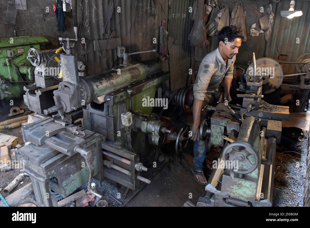 Dhaka, Bangladesh. 15th May, 2017. A Bangladeshi worker makes vehicle ...