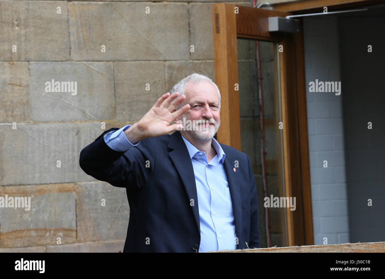 Hebden Bridge, UK. 15th May, 2017. Jeremy Corbyn waves to supporters at ...
