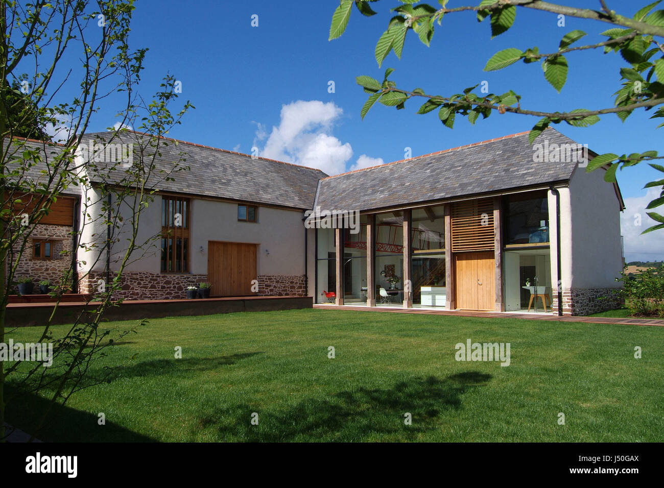 A barn conversion in Devonshire, UK Stock Photo - Alamy