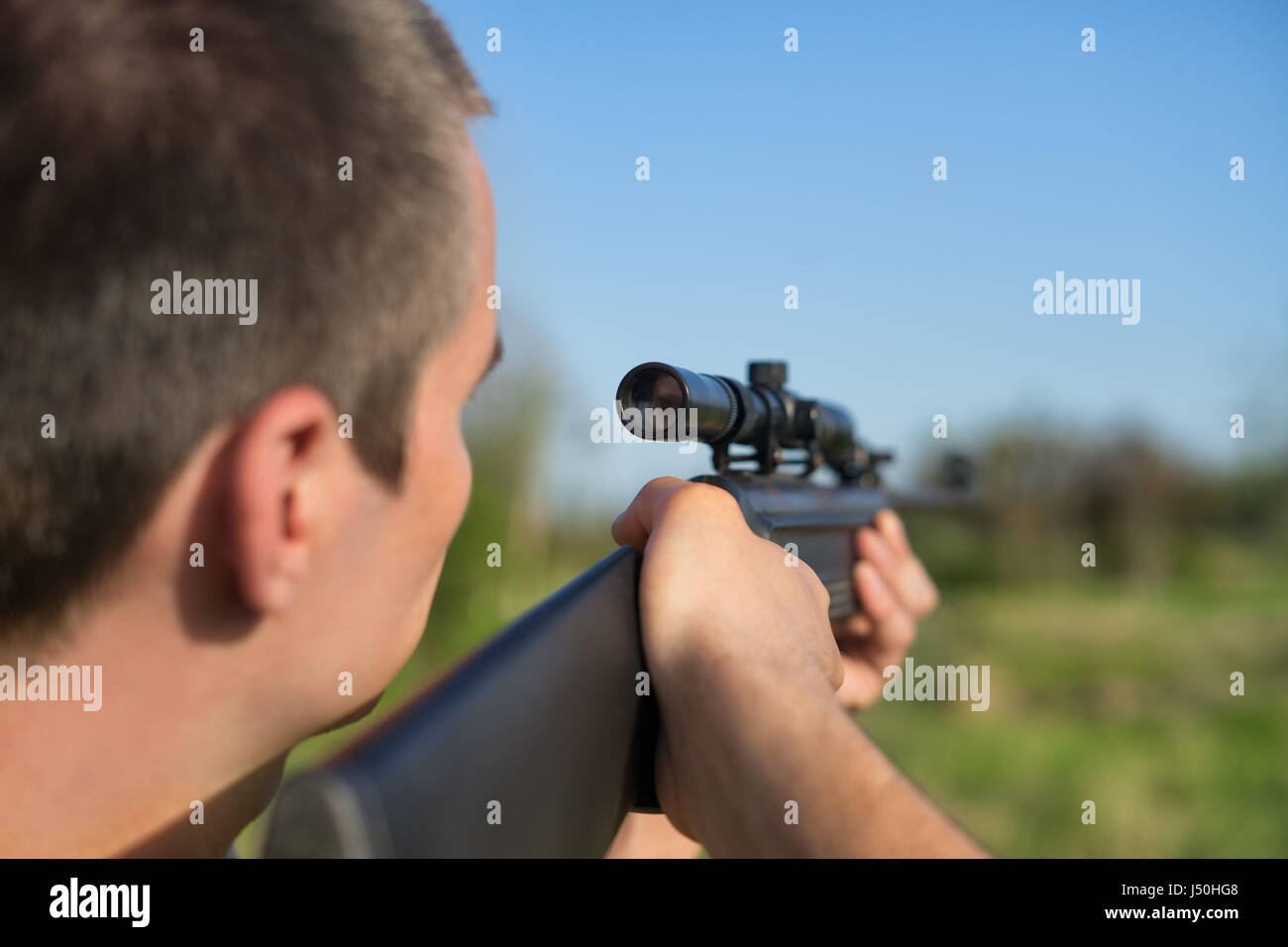 Holding a sniper rifle hi-res stock photography and images - Alamy