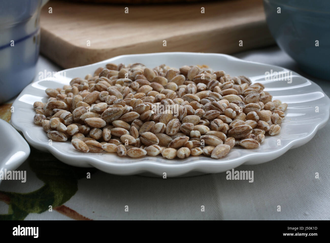 Wheat in ceramic plate Stock Photo - Alamy