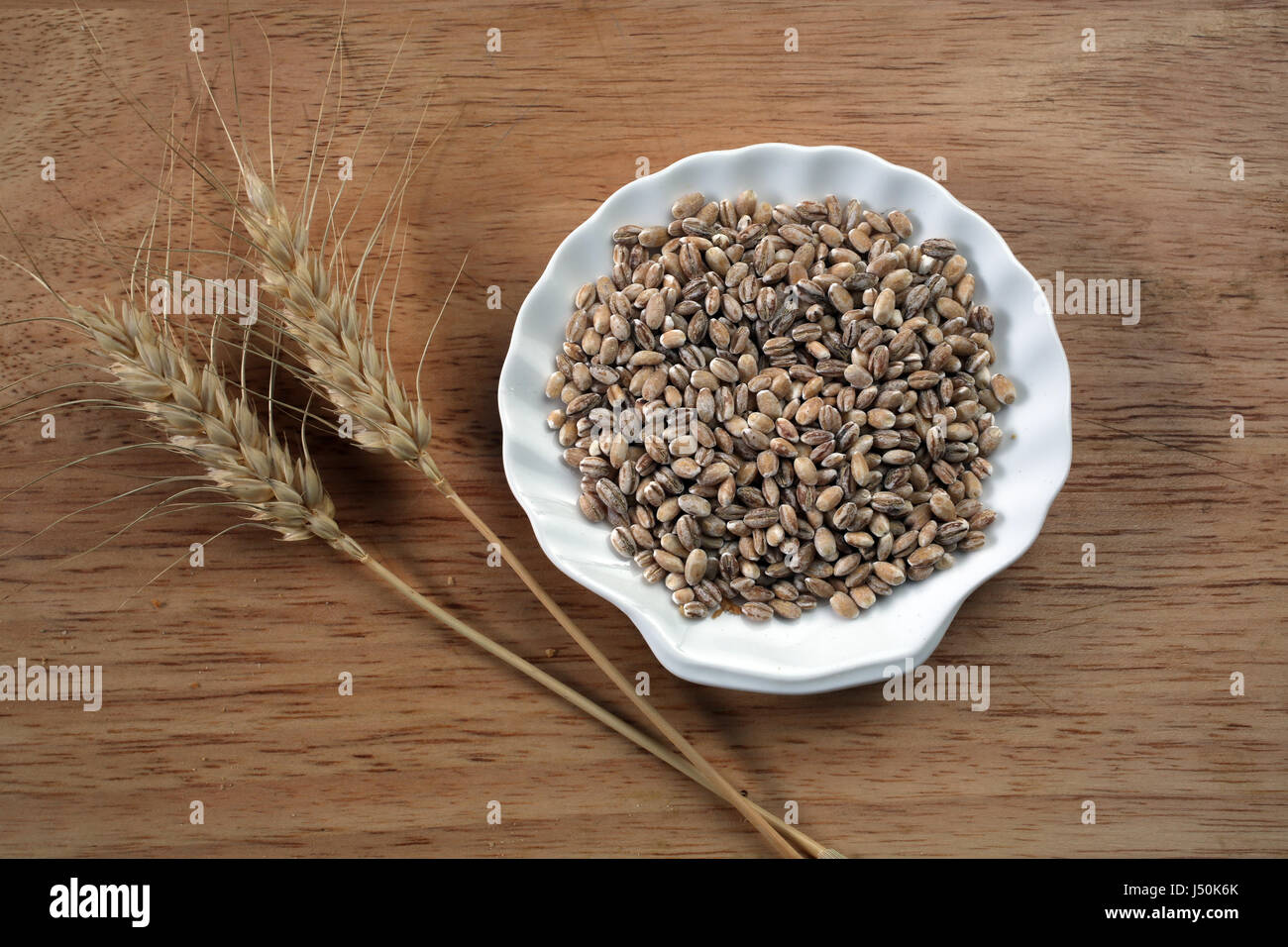Wheat in ceramic plate Stock Photo - Alamy