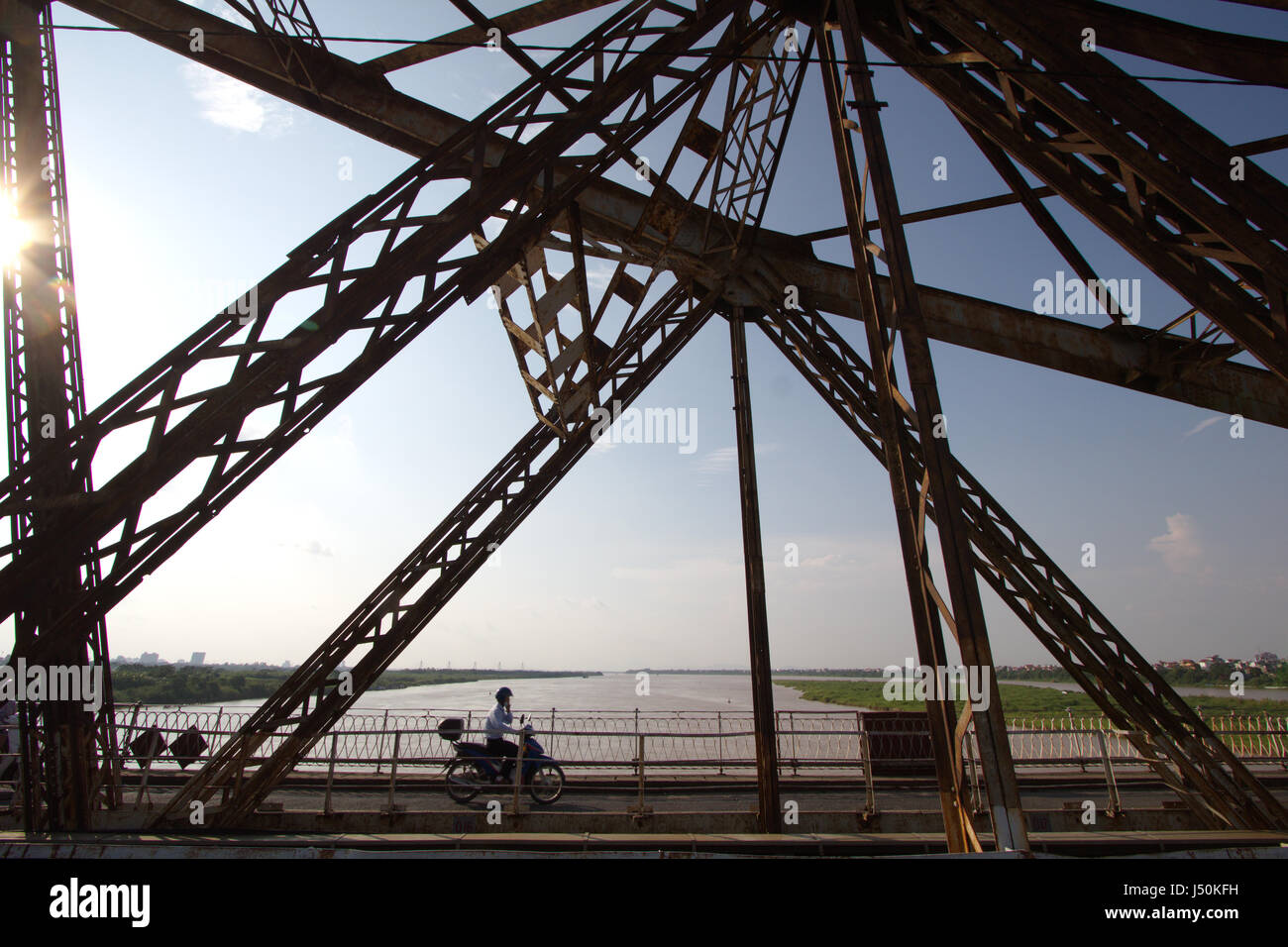 The French-built Long Bien Bridge passes over the Red River at Hanoi ...