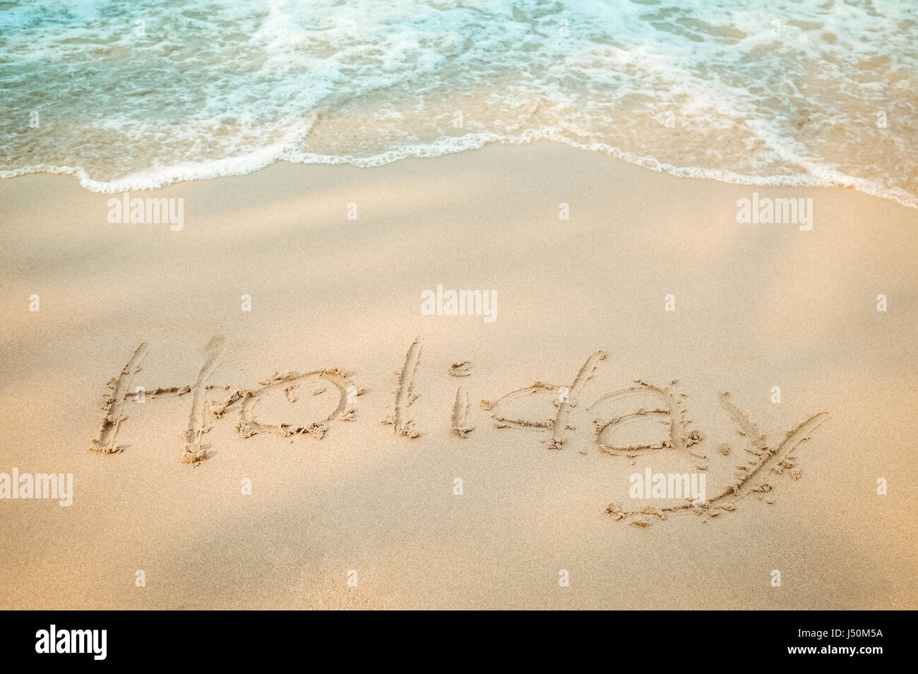 Alphabet writing on sand letter hi-res stock photography and images - Alamy