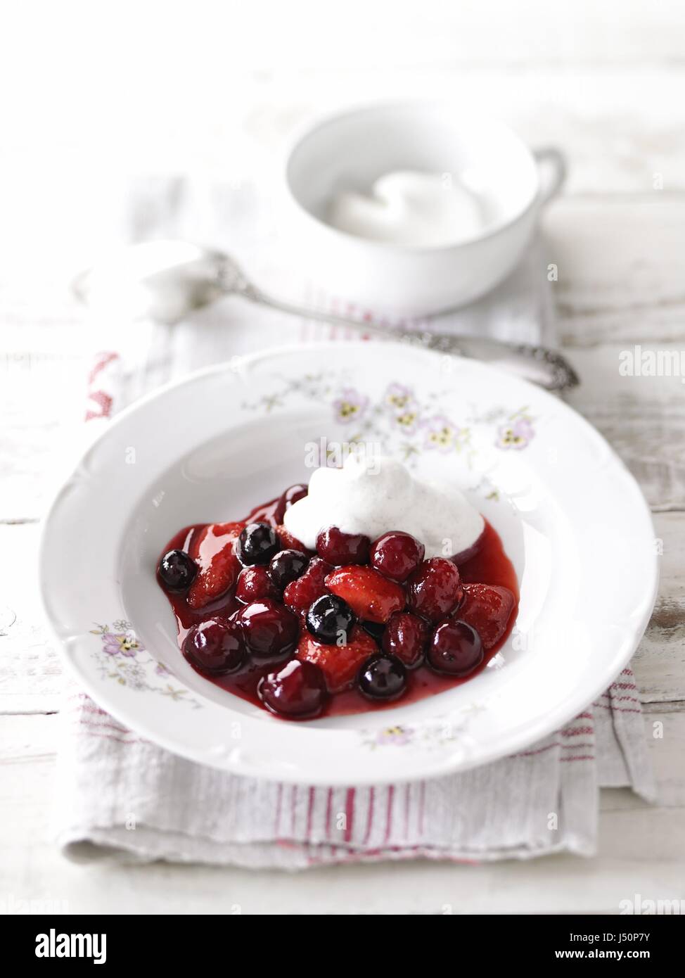 Red berry compote Stock Photo - Alamy