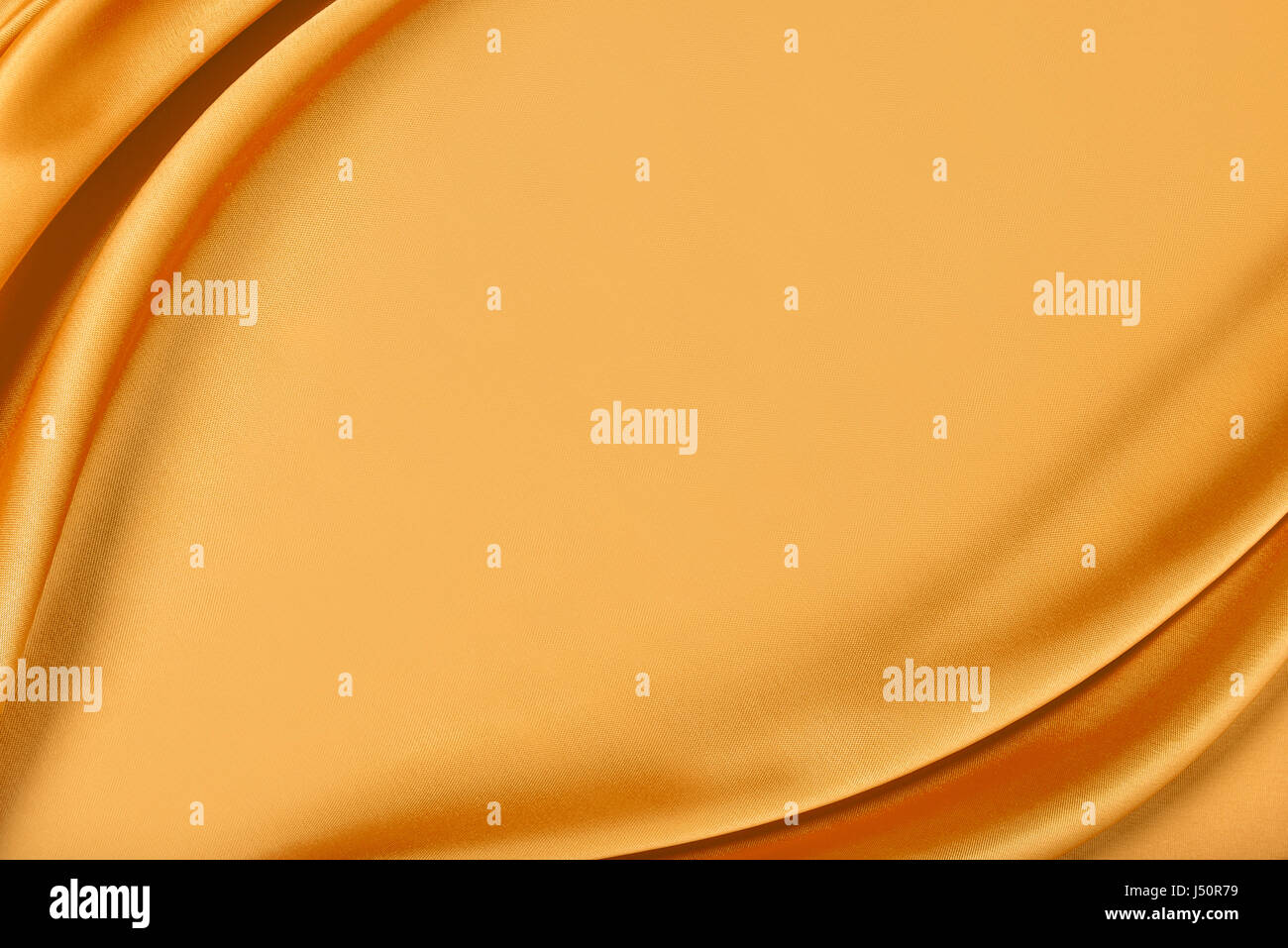 Gold silk satin Stock Photo - Alamy