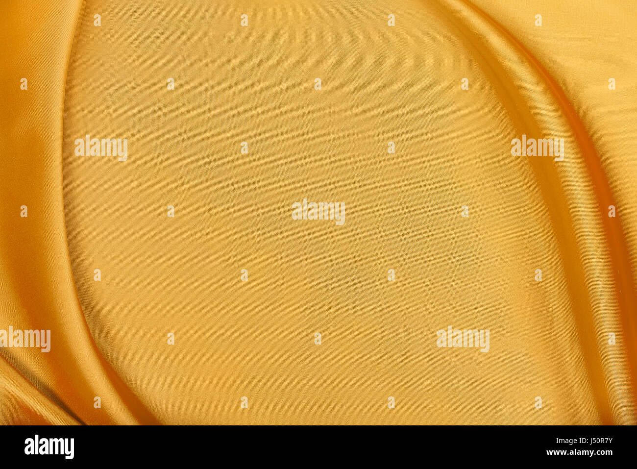 Gold silk satin Stock Photo - Alamy