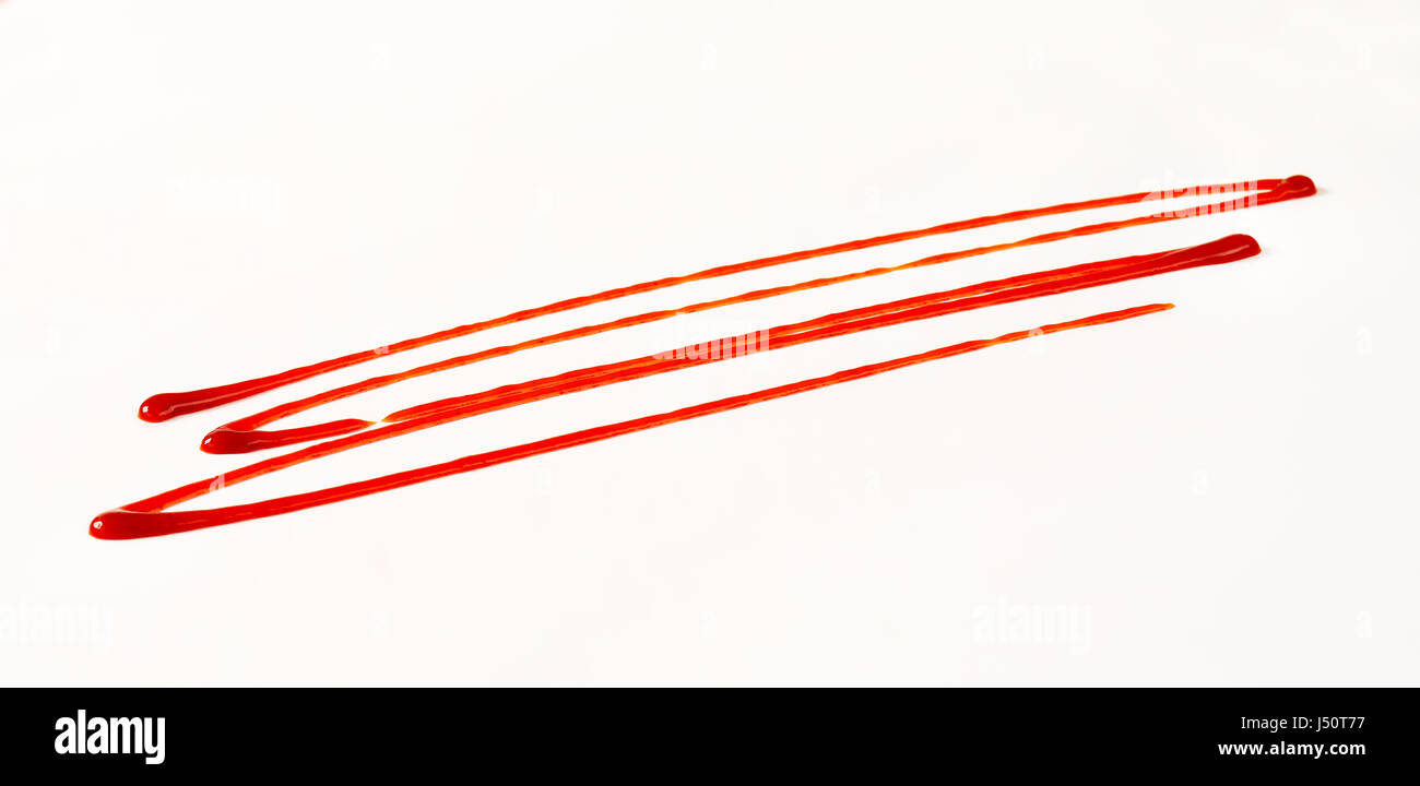 strawberry sauce drizzle on white background Stock Photo - Alamy