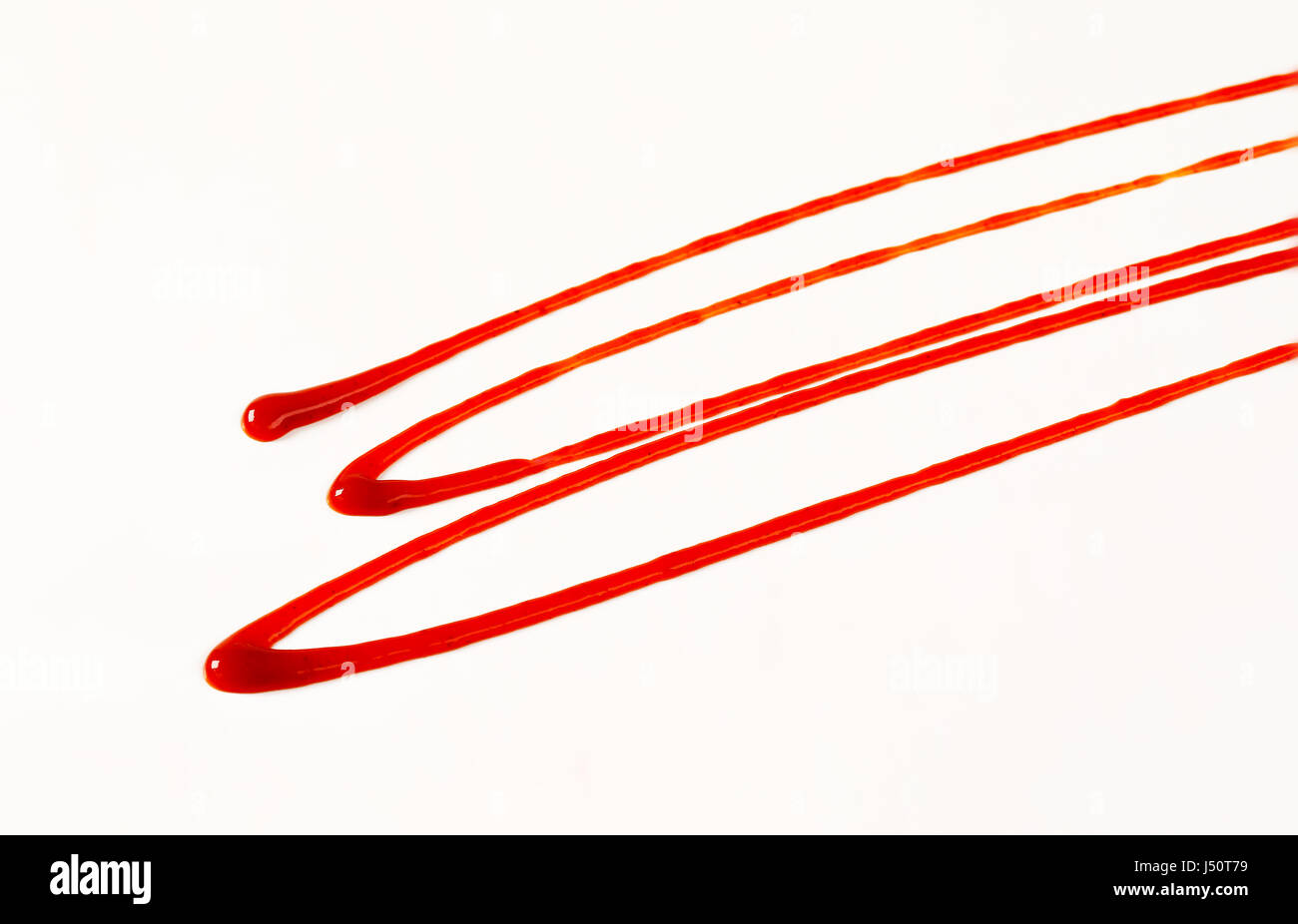 strawberry sauce drizzle on white background Stock Photo - Alamy