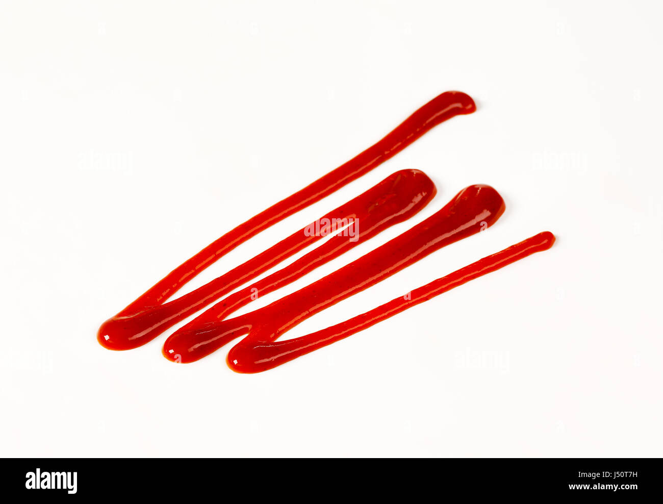 strawberry sauce drizzle on white background Stock Photo - Alamy