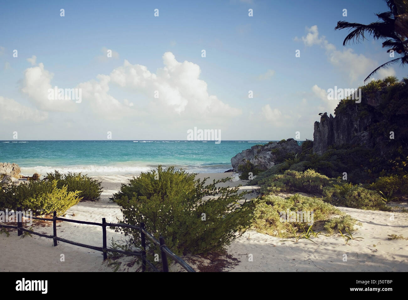 mexican beach with clouds in tulum Stock Photo - Alamy