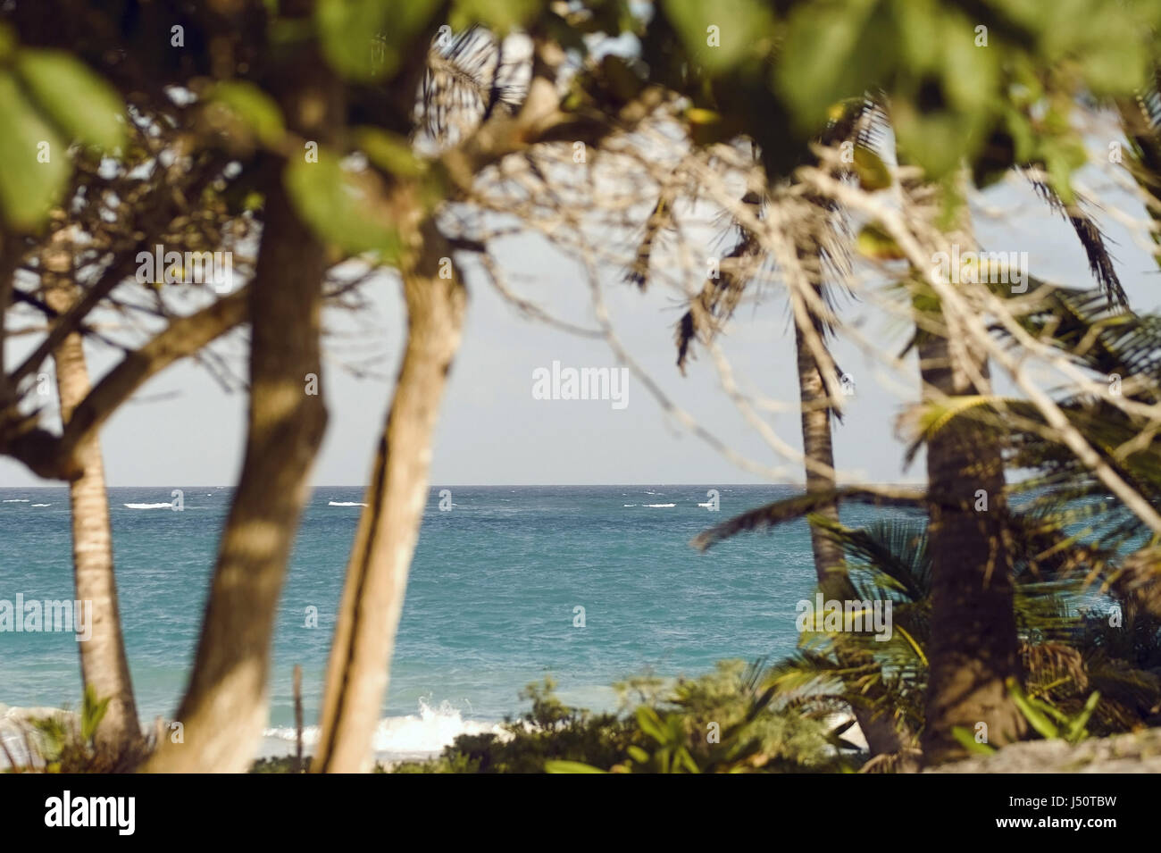 mexican beach with clouds in tulum Stock Photo - Alamy