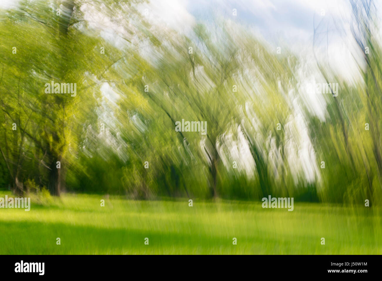 blurred motion spring landscape background Stock Photo - Alamy