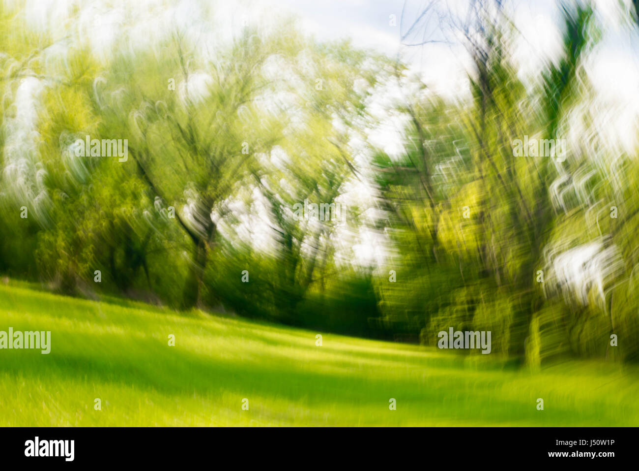 blurred motion spring landscape background Stock Photo - Alamy