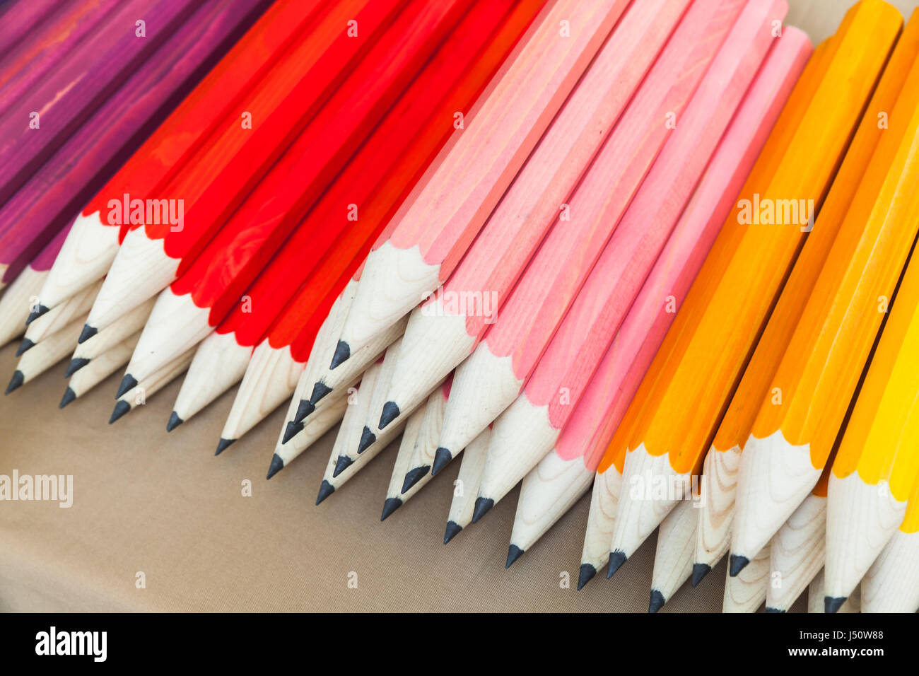 Stack of colorful graphite pencils, closeup photo with selective focus ...