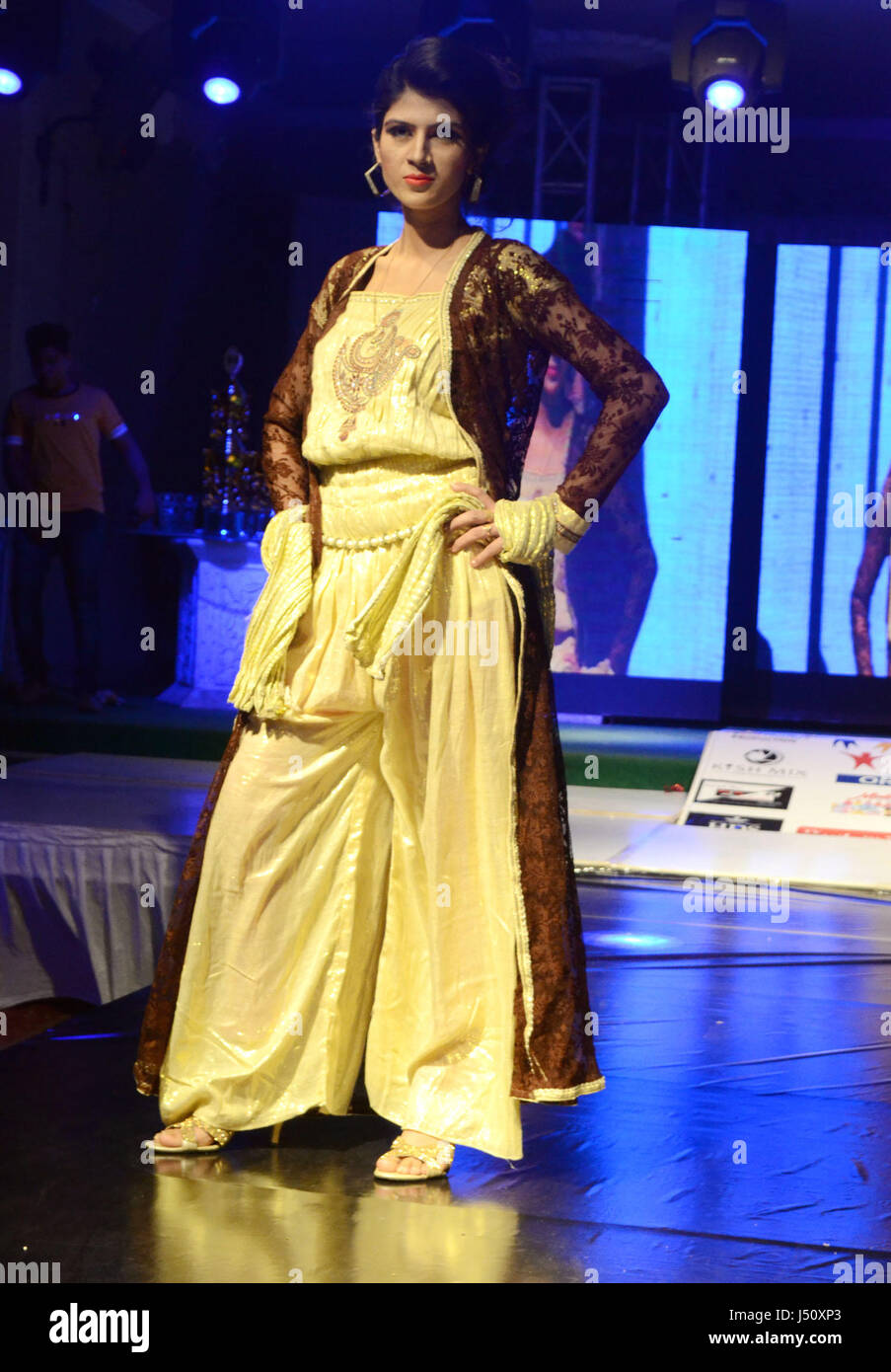 A model give pose on the ramp during the fashion show in Hyderabad ...