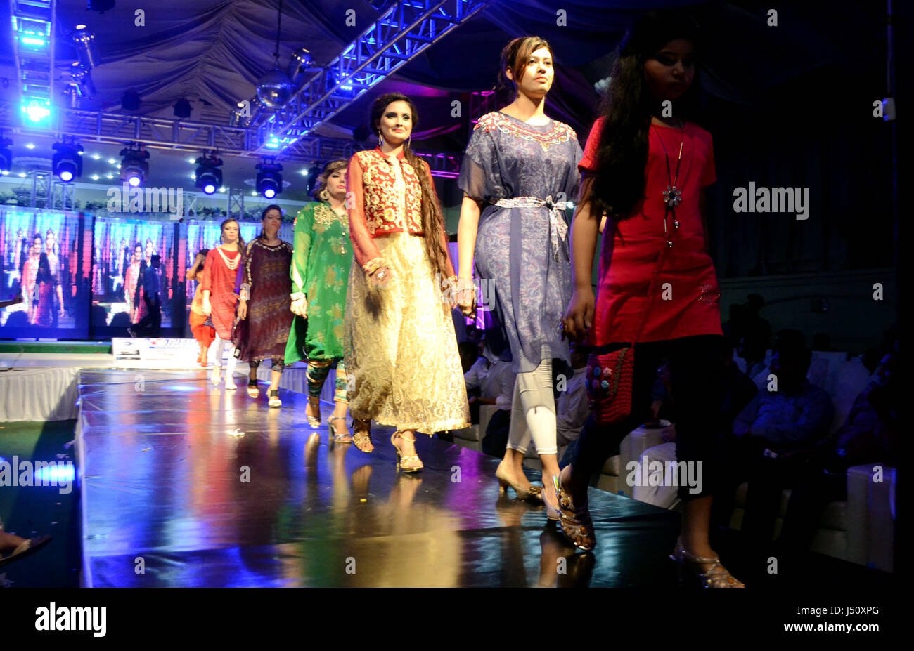 Models walks on the ramp during a fashion show in Hyderabad, they were ...