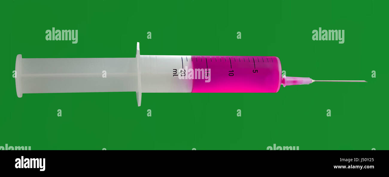 Isolated syringe with needle with purple liquid on green background ...