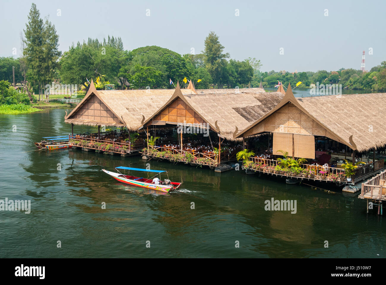 Floating Raft Restaurant beneath the Death Bridge on the River Kwae at ...