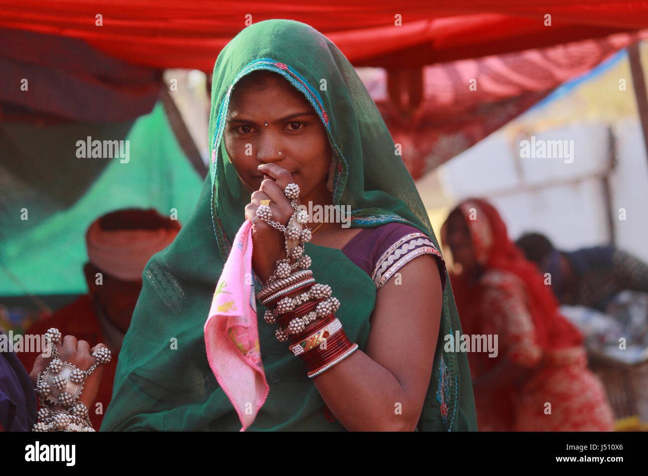 Woman in traditional attire. Kawant Festival, Gujarat, India Stock ...