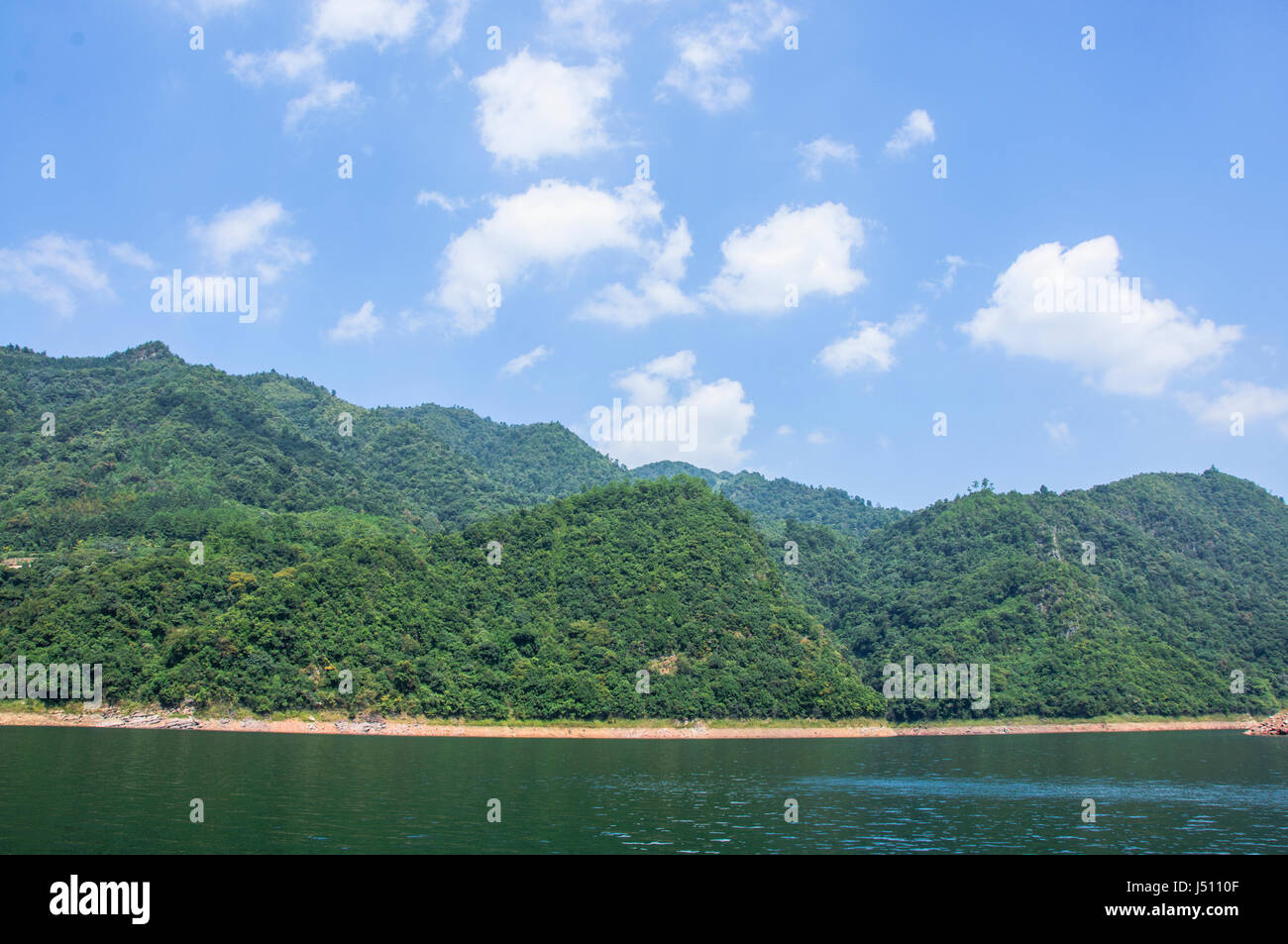 The reservoir scenery with blue sky in summer Stock Photo - Alamy