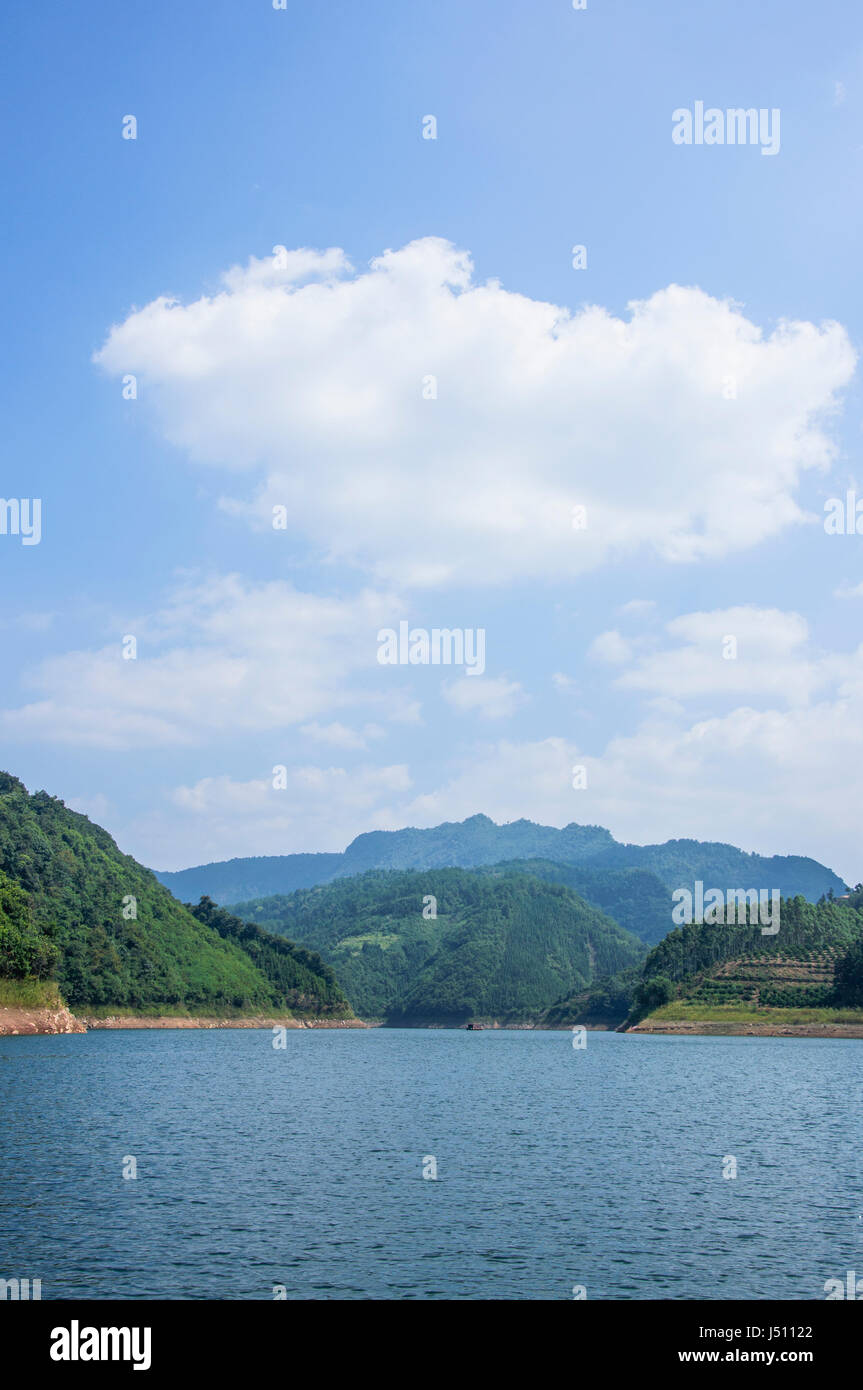 The reservoir scenery with blue sky in summer Stock Photo - Alamy