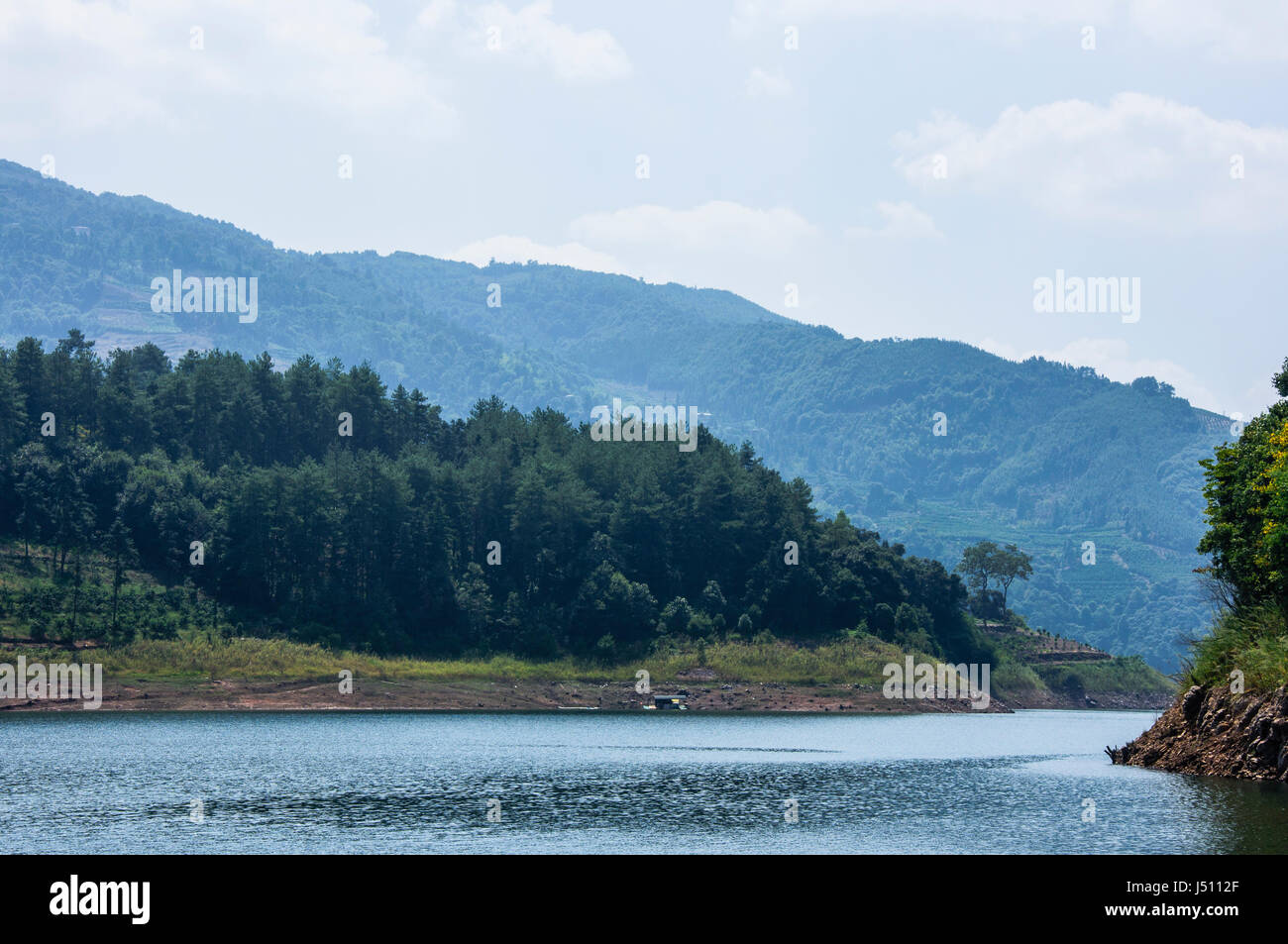 The reservoir scenery with blue sky in summer Stock Photo - Alamy