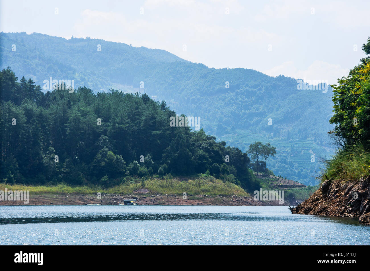 The reservoir scenery with blue sky in summer Stock Photo - Alamy