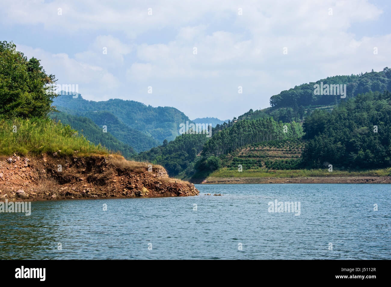 The reservoir scenery with blue sky in summer Stock Photo - Alamy