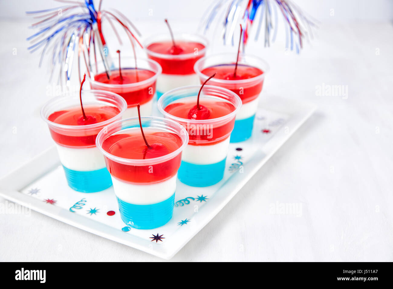 Striped jelly shots with firecracker star Stock Photo - Alamy
