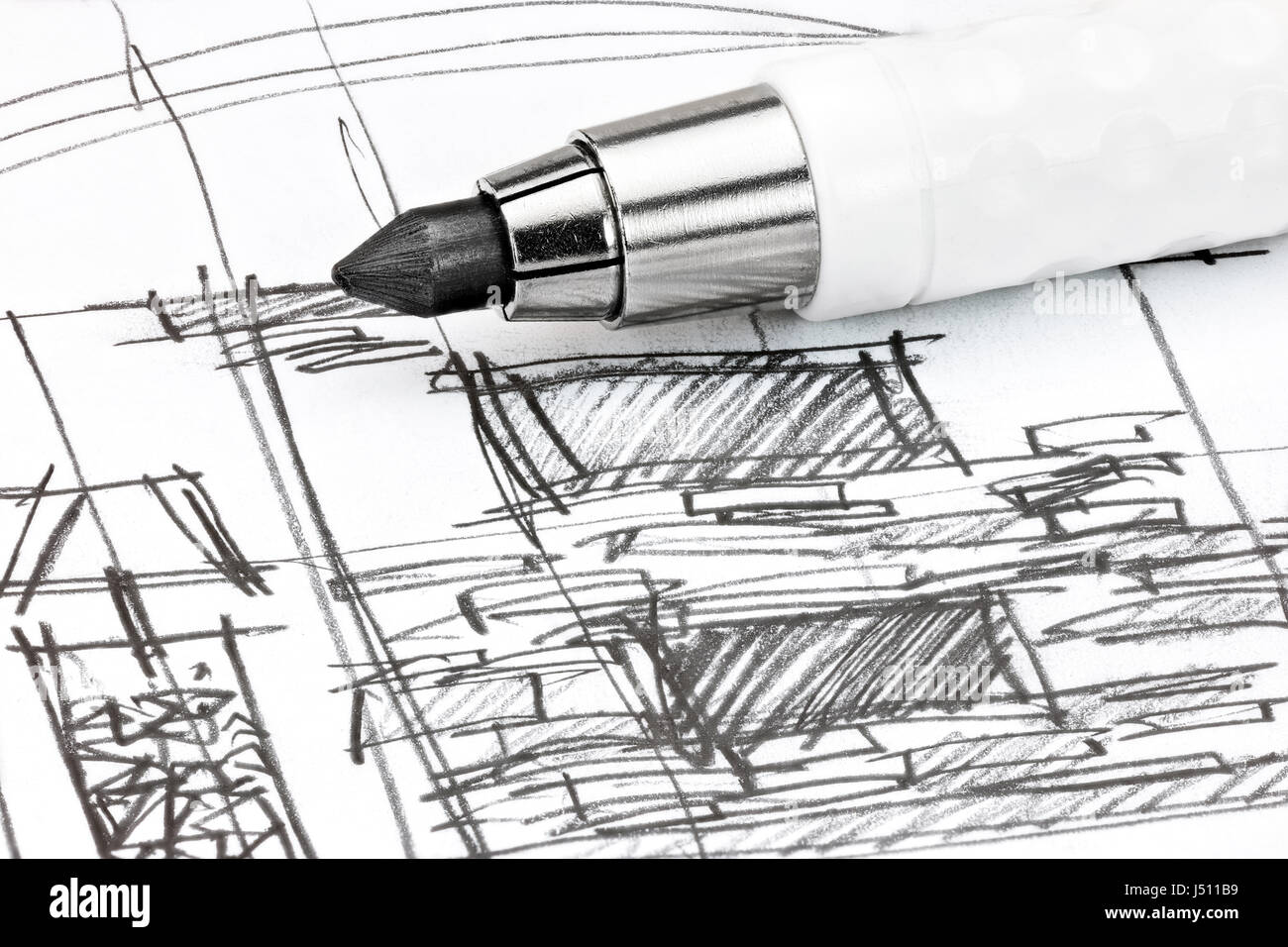 draft interior sketch for living room and mechanical pencil macro view ...