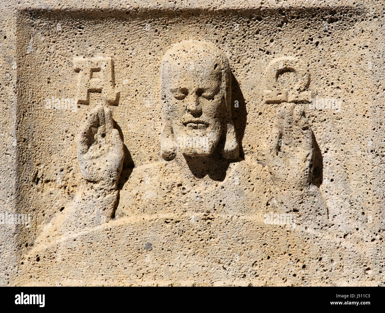 Jesus alpha and omega headstone on Mirogoj cemetery in Zagreb, Croatia ...