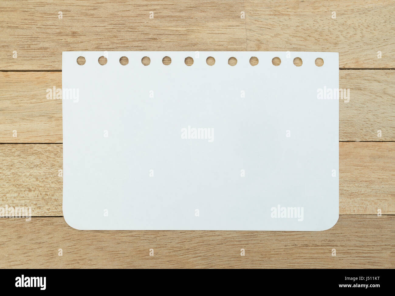 Blank notebook sheet on wood background Stock Photo - Alamy
