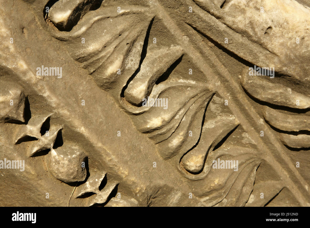 Ornately designed panels carved into stone tablet Stock Photo - Alamy