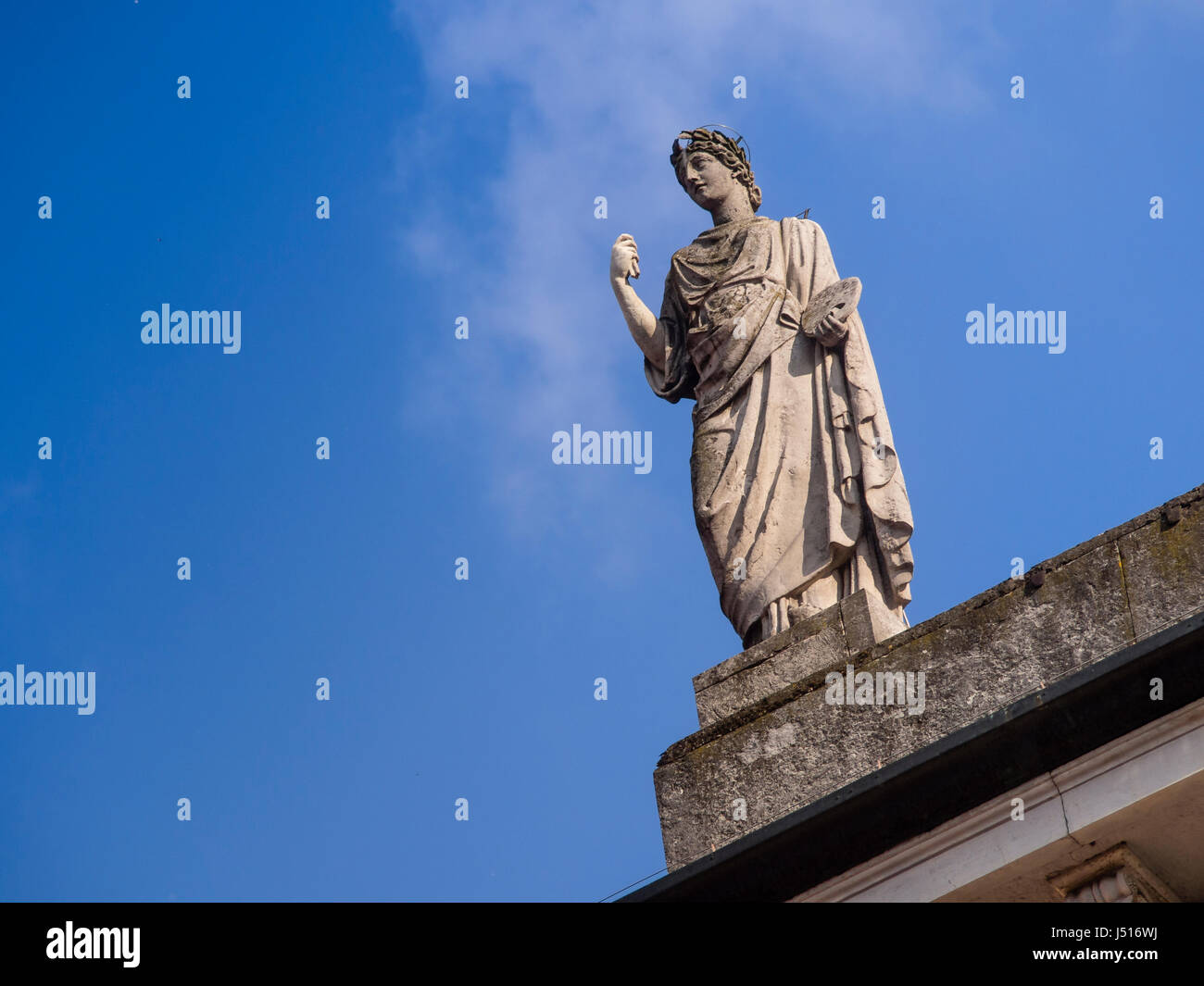 Statue in a roof Stock Photo - Alamy