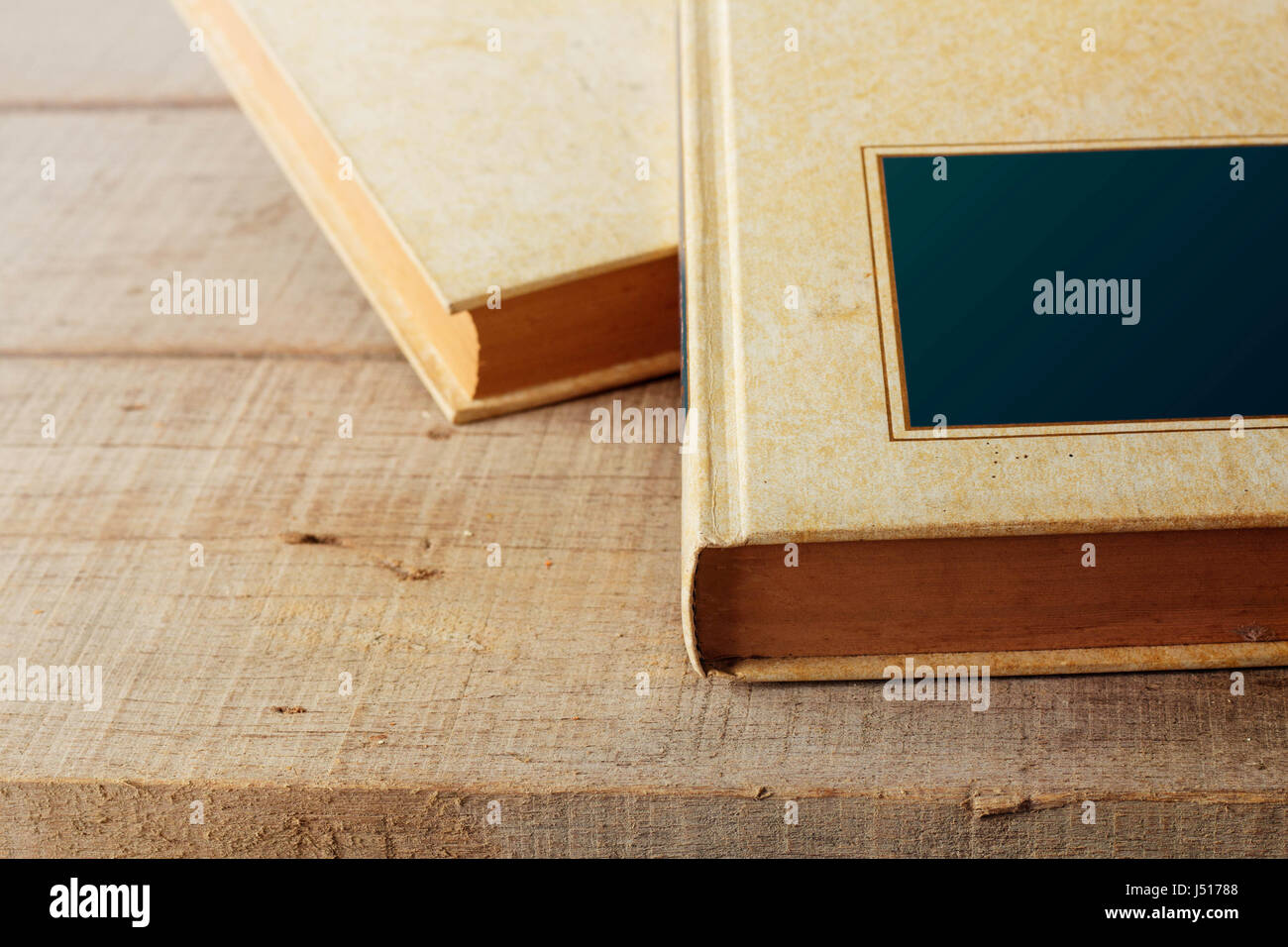 Old books on a wooden floors Stock Photo - Alamy