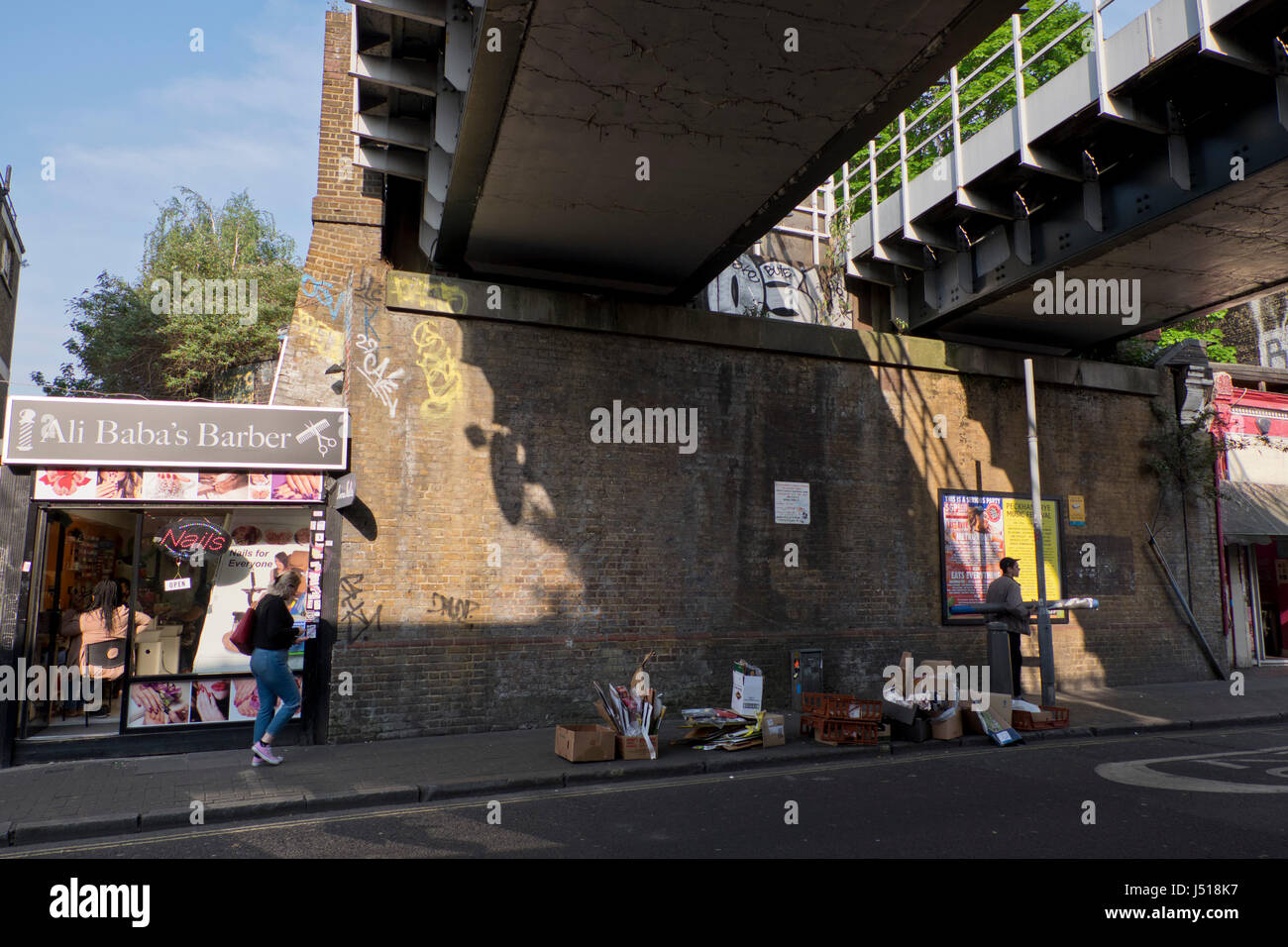 People walking and cycling near Peckham Rye station in London,UK Stock ...
