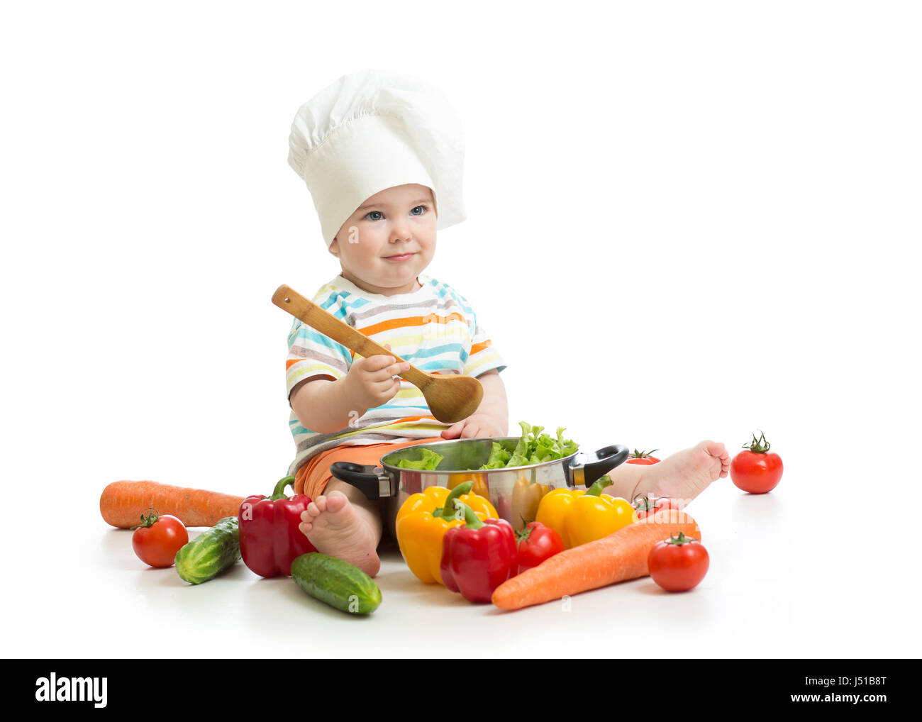 baby chef with healthy food vegetables and pan Stock Photo - Alamy