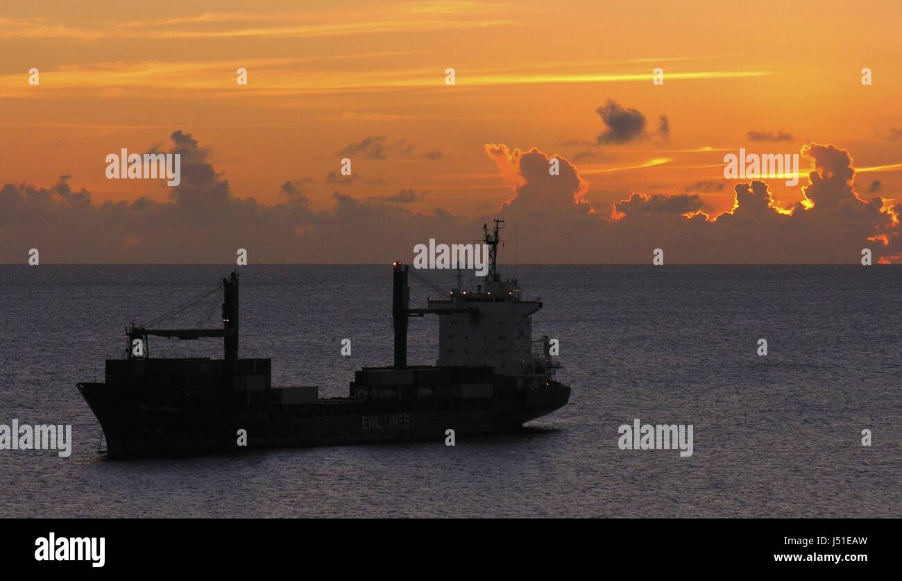 sunset phantom ship orange caribbean salt water sea ocean water red ...