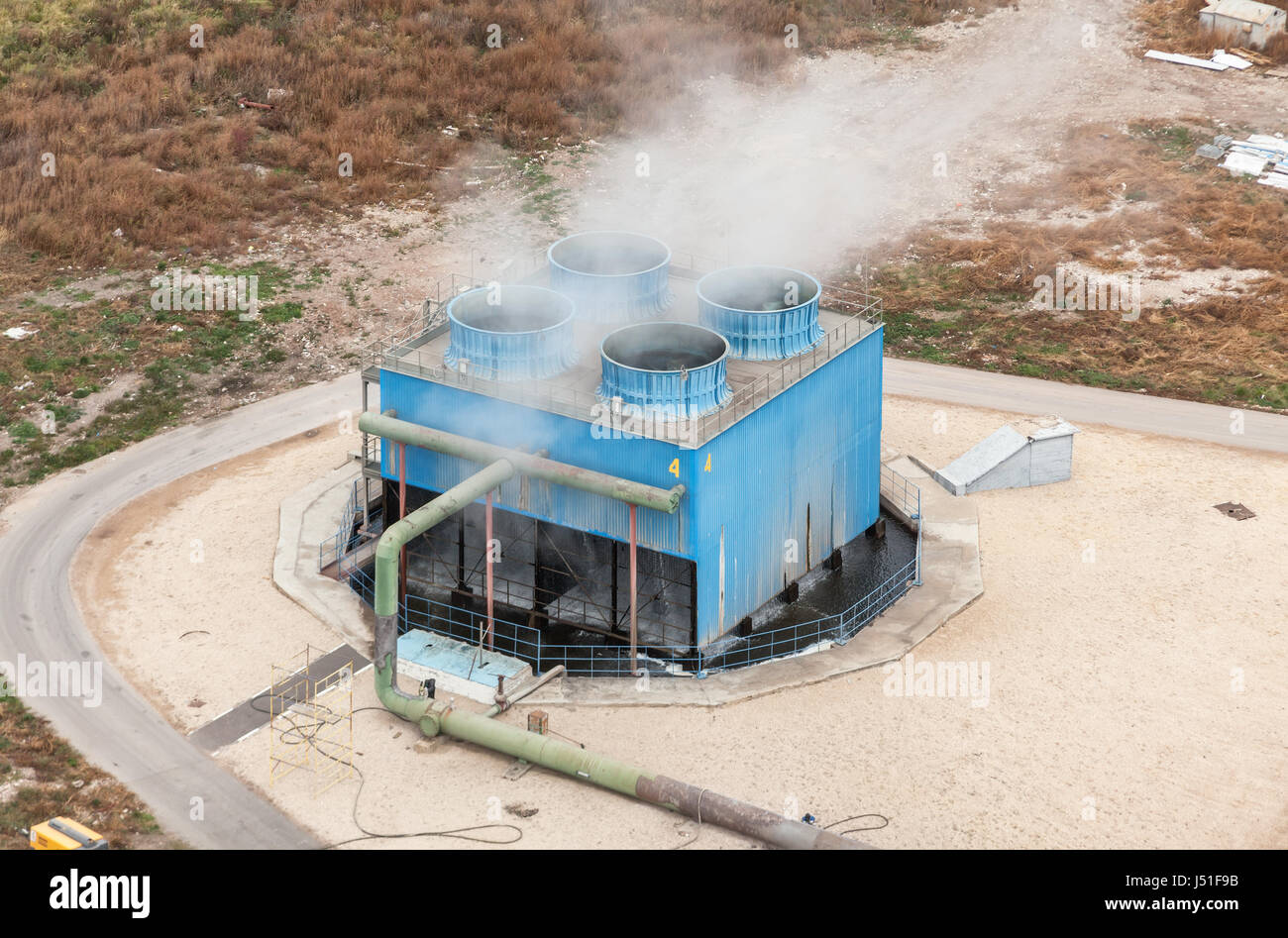 Blue industrial cooling tower at a chemical plant. Top view. Focus on ...