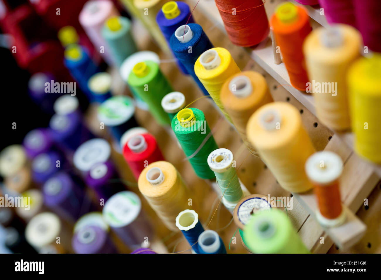 Rolls of thread for use in sewing Stock Photo - Alamy
