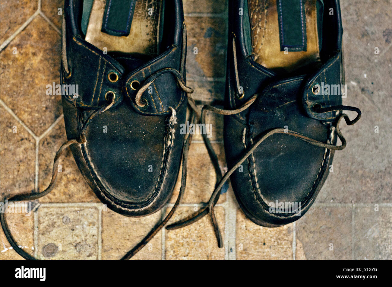 A pair of old shoes in my basement Stock Photo - Alamy