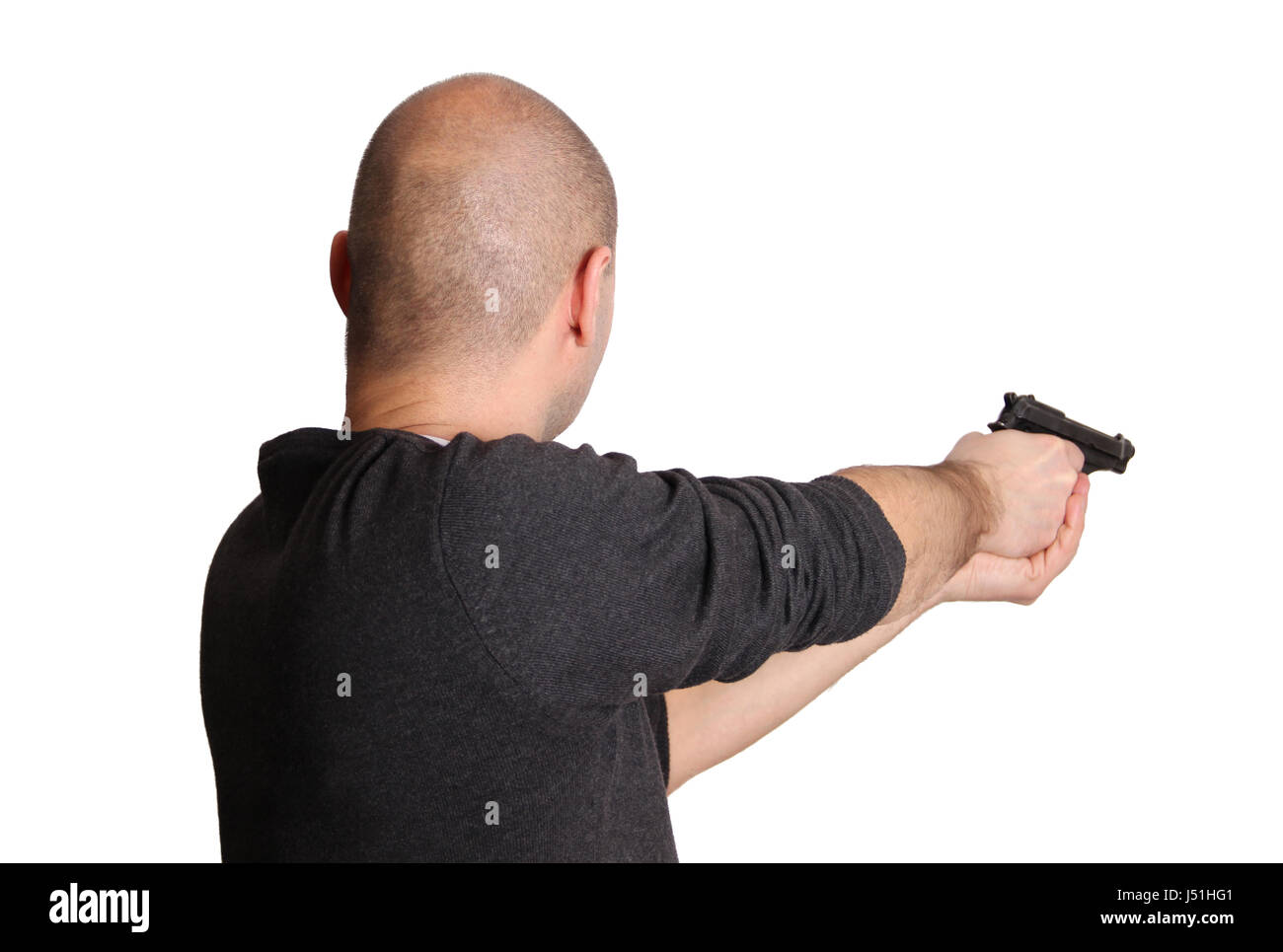 Man with a gun Stock Photo - Alamy