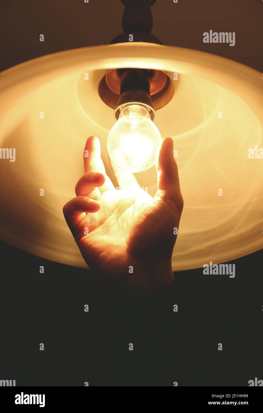 Changing light bulb hi-res stock photography and images - Alamy
