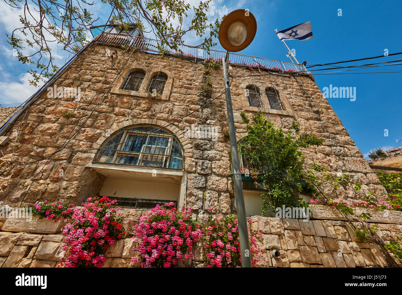 Jerusalem, old house in the center of the city with Israeli flag Stock ...