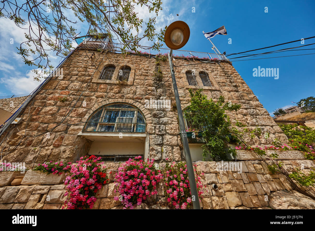 Jerusalem, old house in the center of the city with Israeli flag Stock ...